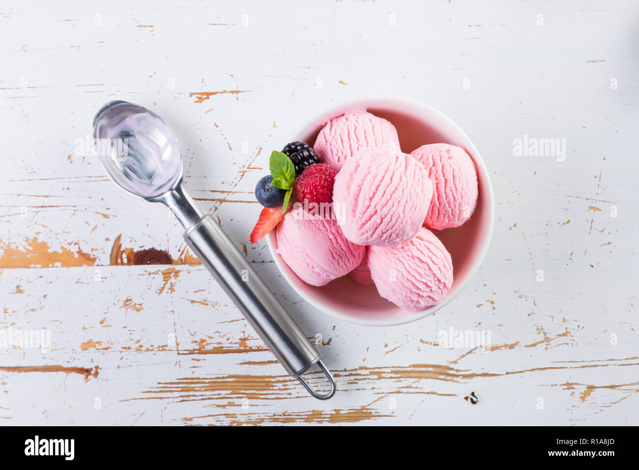 Berry ice cream with fresh fruits Stock Photo - Alamy