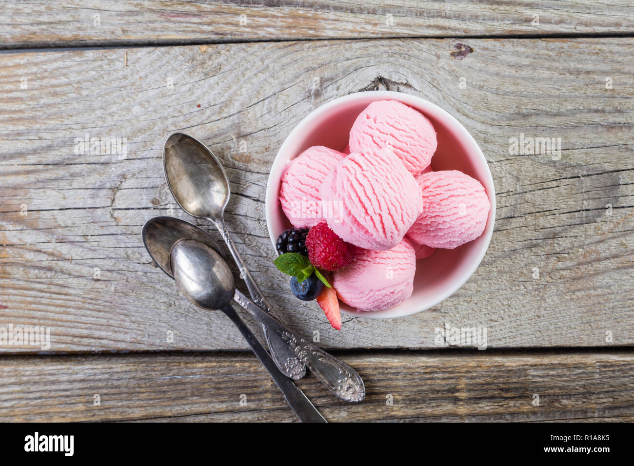 Berry ice cream with fresh fruits Stock Photo - Alamy