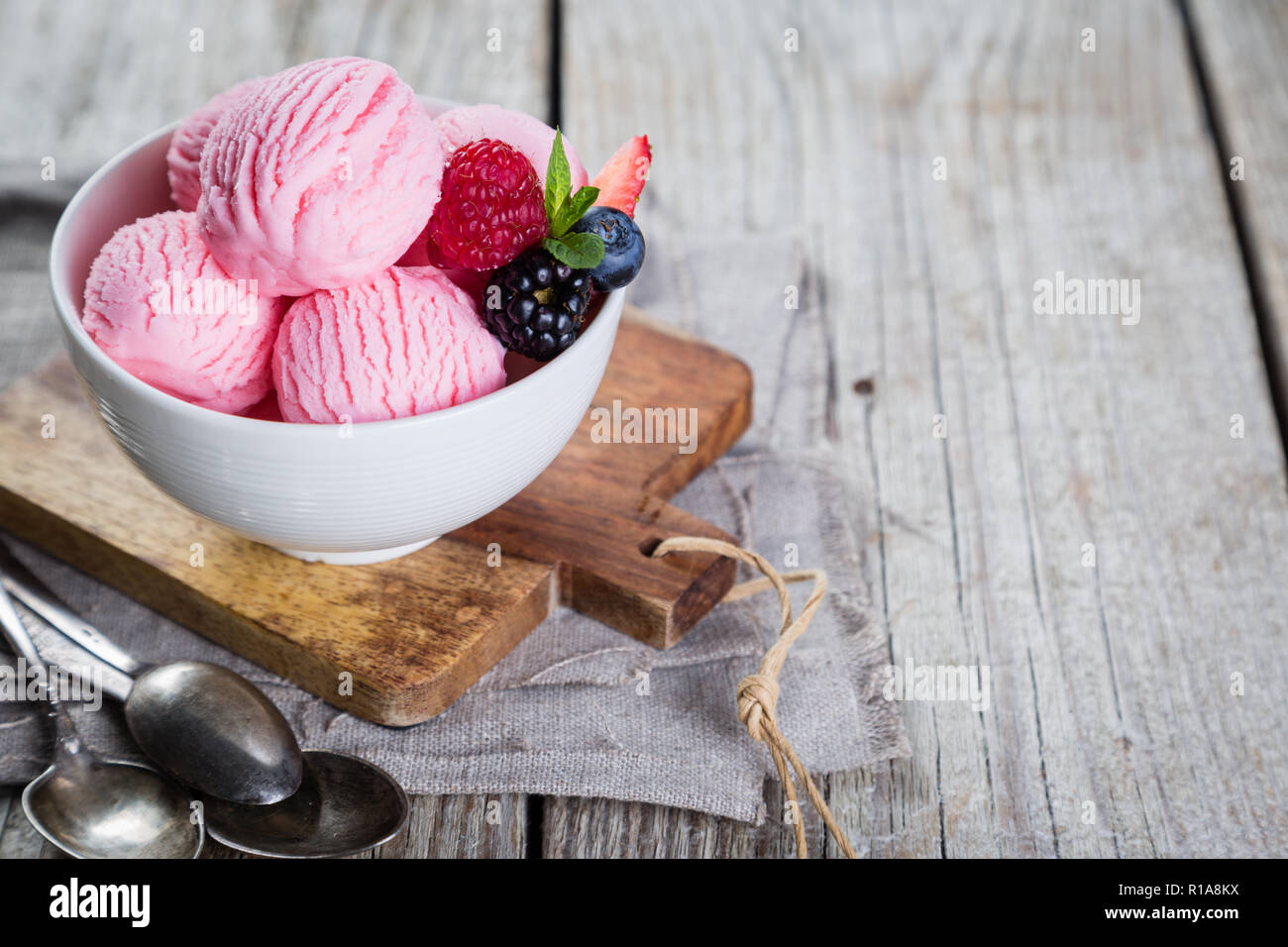 Berry ice cream with fresh fruits Stock Photo - Alamy
