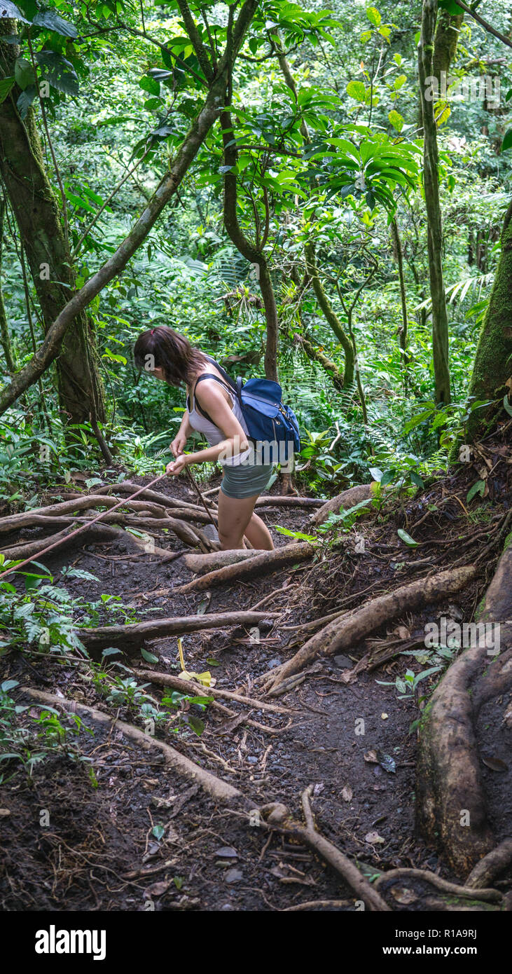 Woman climbing down rope hi-res stock photography and images - Alamy