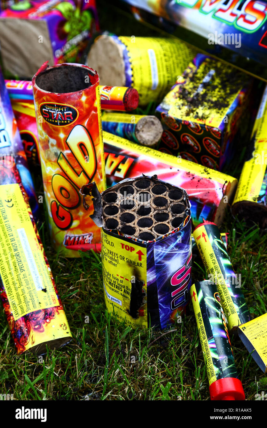 Heap of used burnt firework shells left over from a bonfire night ...