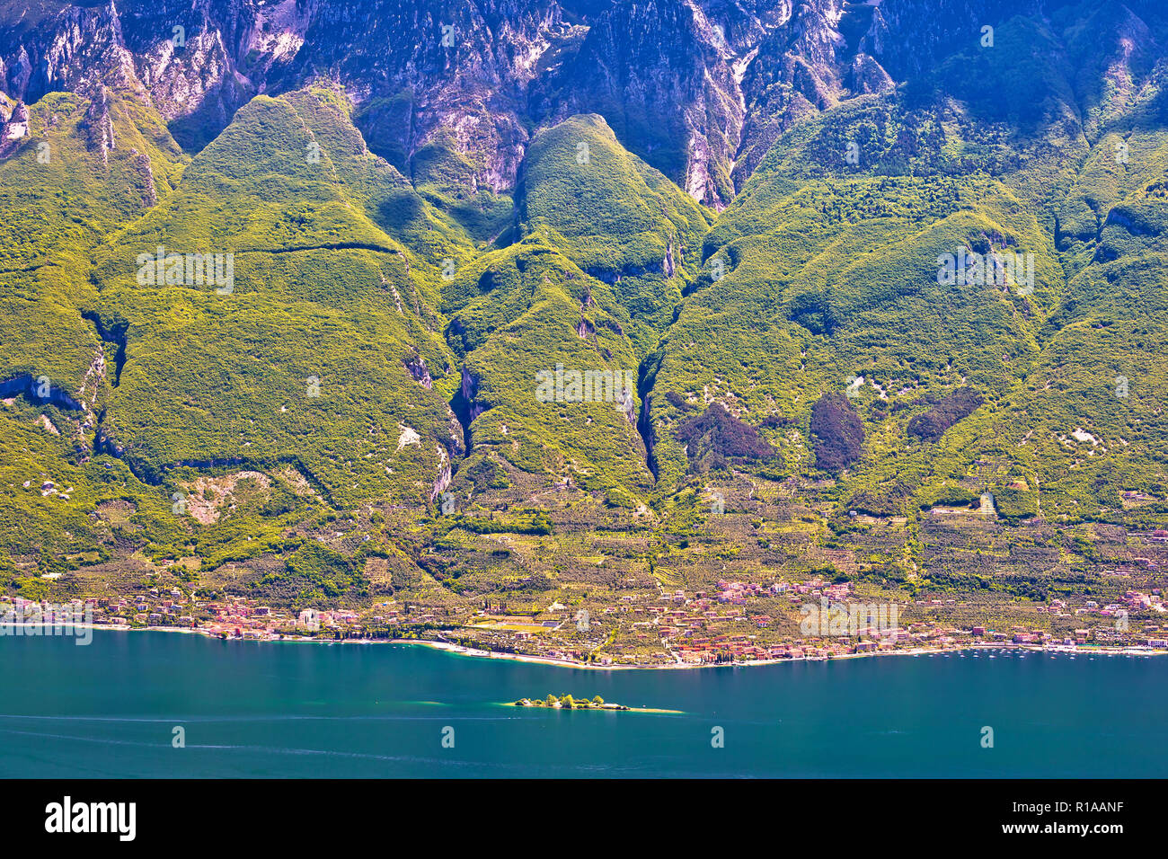 Lago di Garda and high mountain cliffs above Malcesine view, landscapes ...