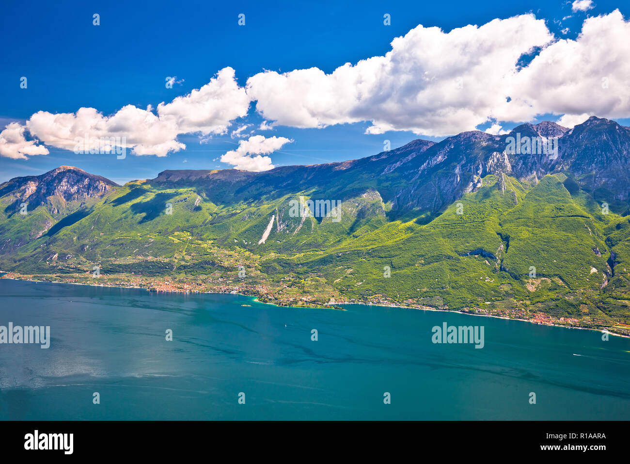 Lago di Garda and high mountain cliffs above Malcesine view, landscapes ...