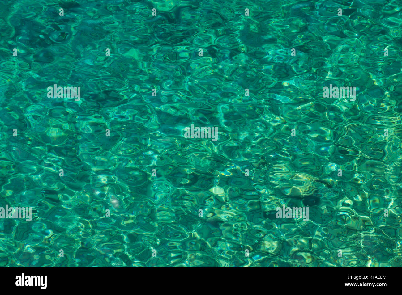 Clear turquoise water texture background Stock Photo - Alamy