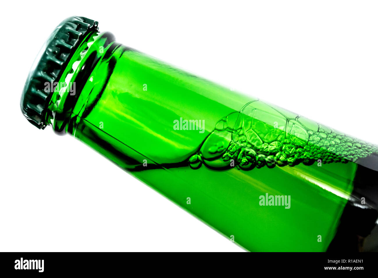 Beer in bottle with bubbles close-up isolated on white background Stock ...