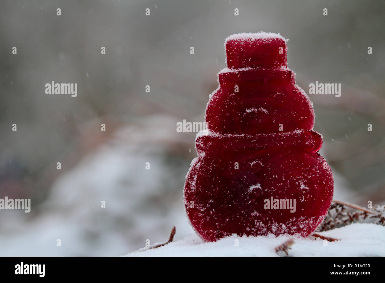 Red ice decoration in garden Stock Photo - Alamy