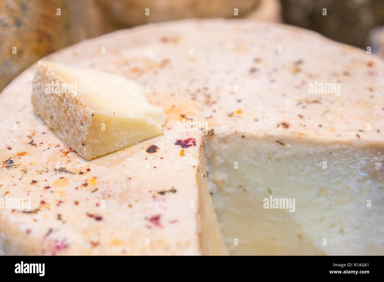 Craft cheese. Cheese head. Artisan cheese. close up Stock Photo - Alamy
