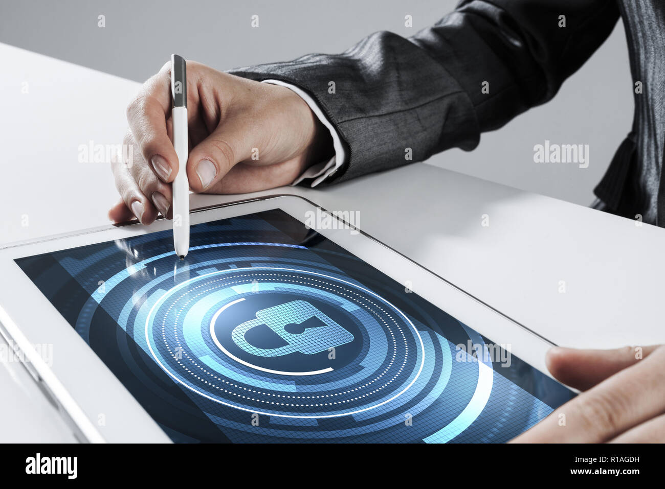 Internet security concept with woman working on media screen wit Stock ...