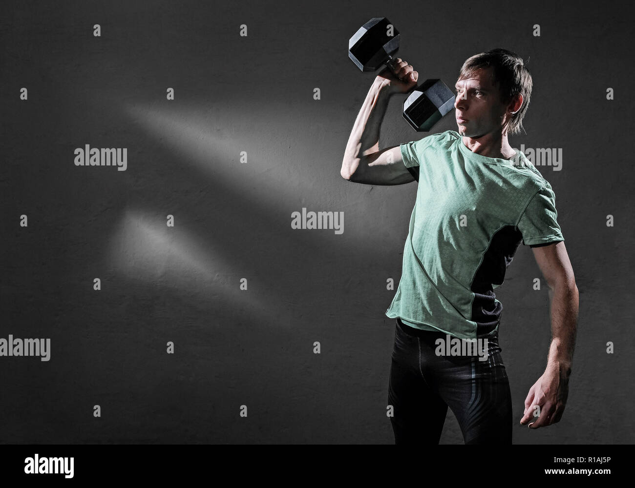 One arm dumbbell hi-res stock photography and images - Alamy
