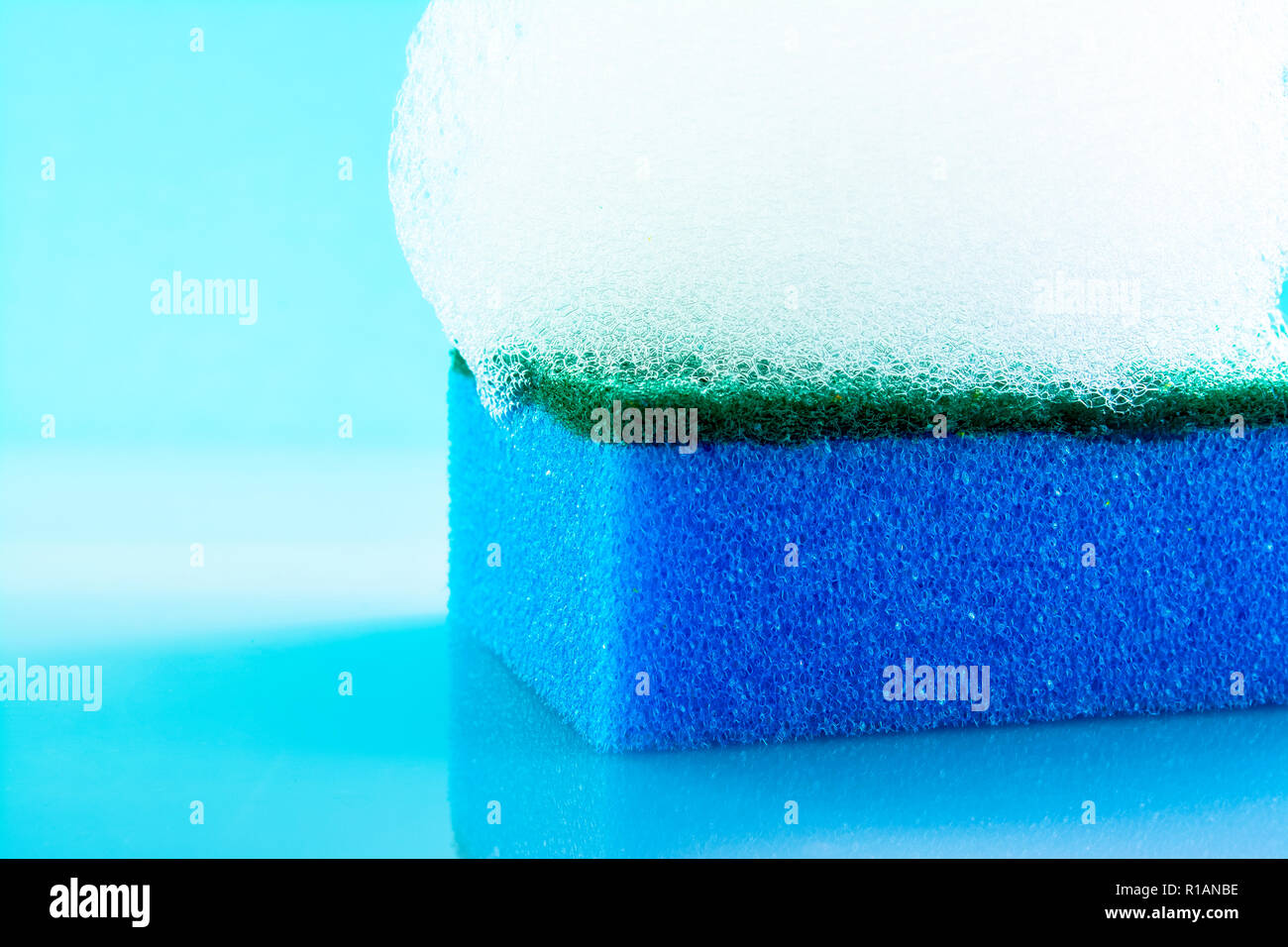 sponge, foam, bubbles, close-up, texture, light blue background Stock ...