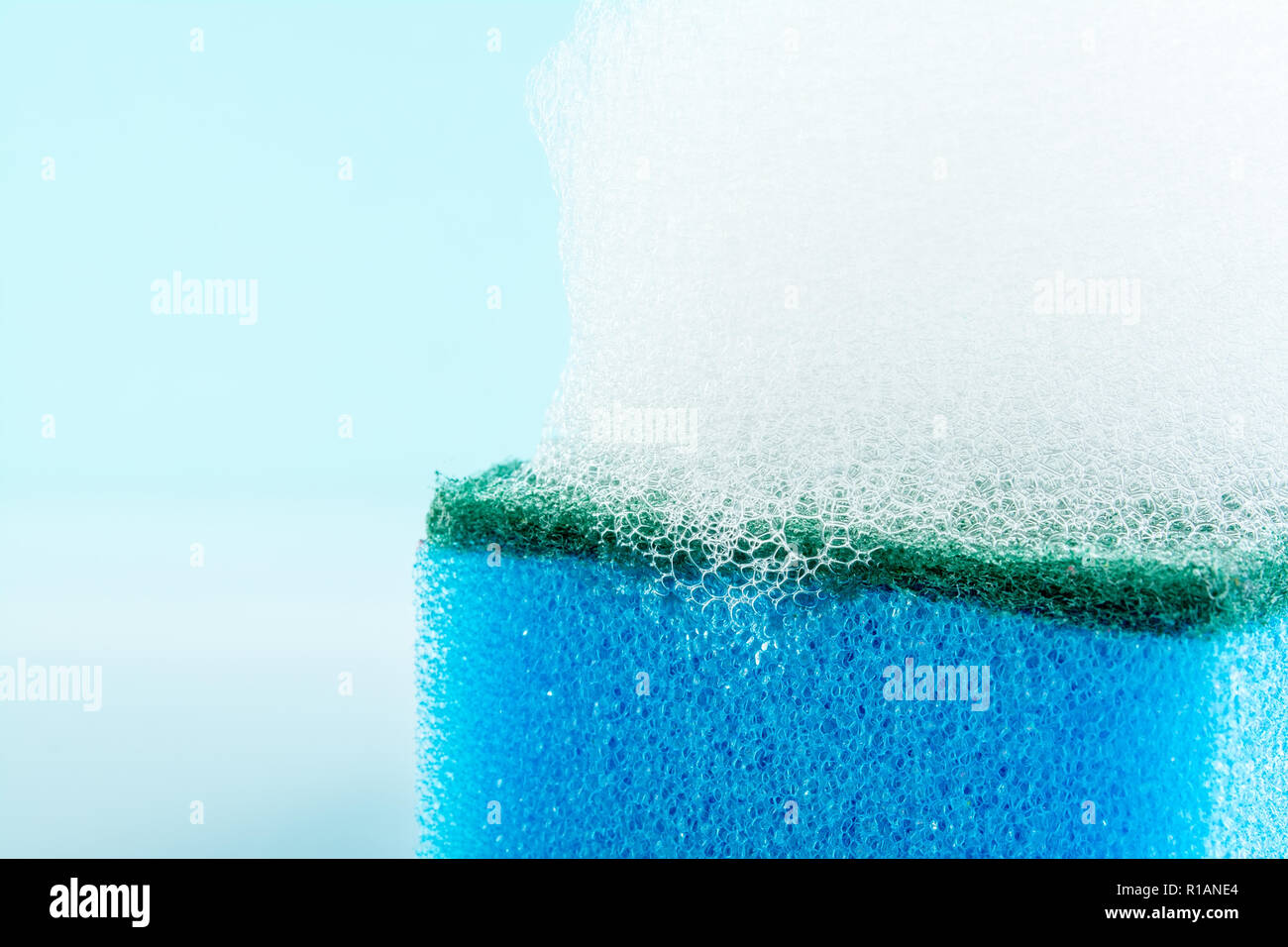 sponge, foam, bubbles, close-up, texture, light blue background Stock ...