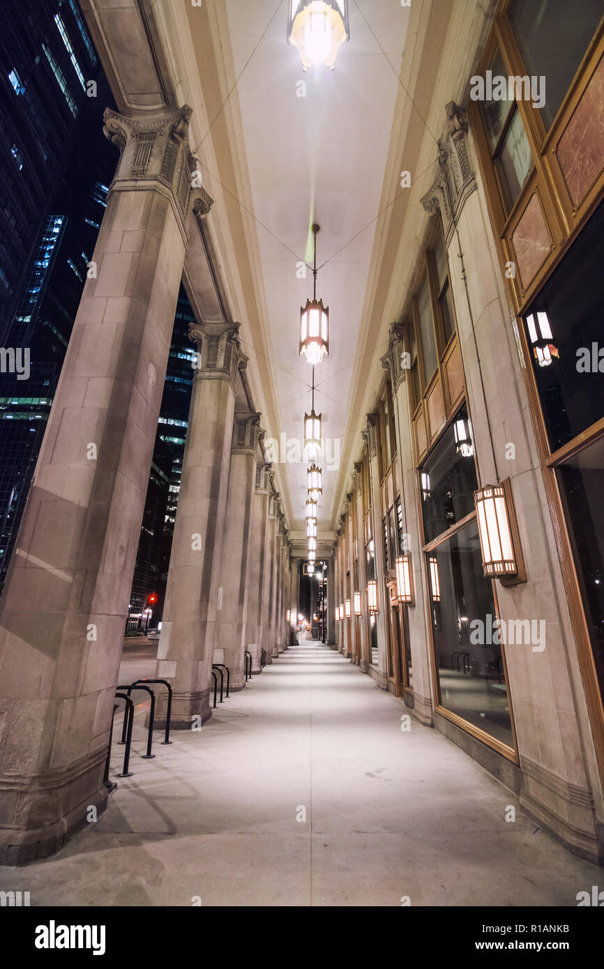 Vintage retro city covered sidewalk portico walkway with lights at ...