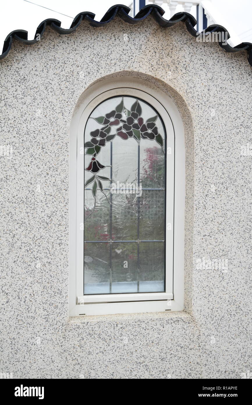 Ornate window in wall Stock Photo - Alamy