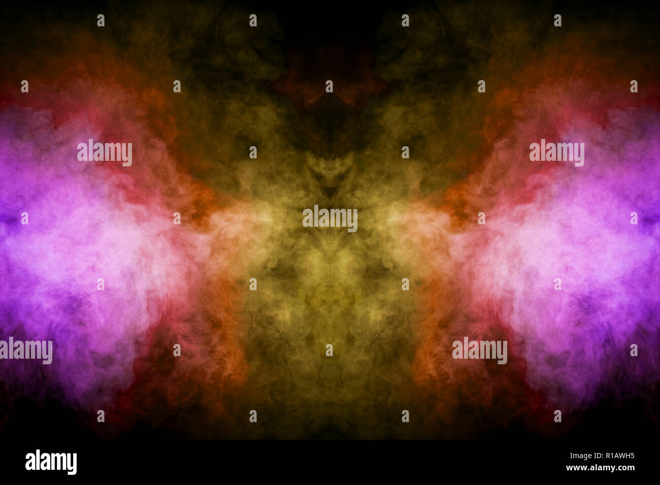 Dense multicolored smoke of pink and yellow colors in the form of a ...