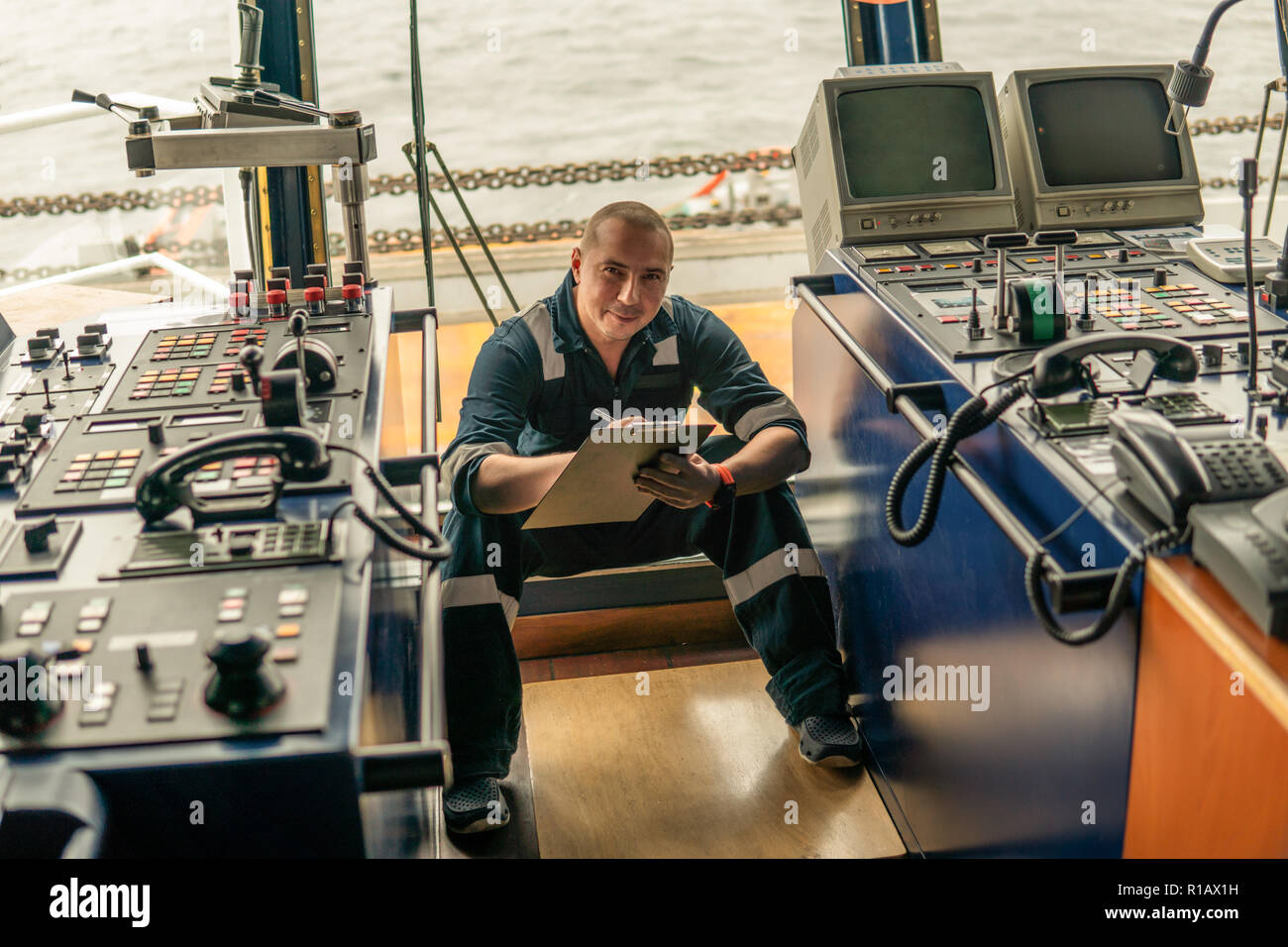 Marine navigational officer or chief mate on navigation watch Stock ...