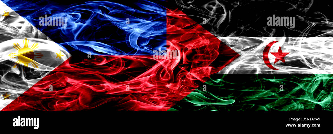 Philippines vs Sahrawi smoke flags placed side by side. Thick abstract ...