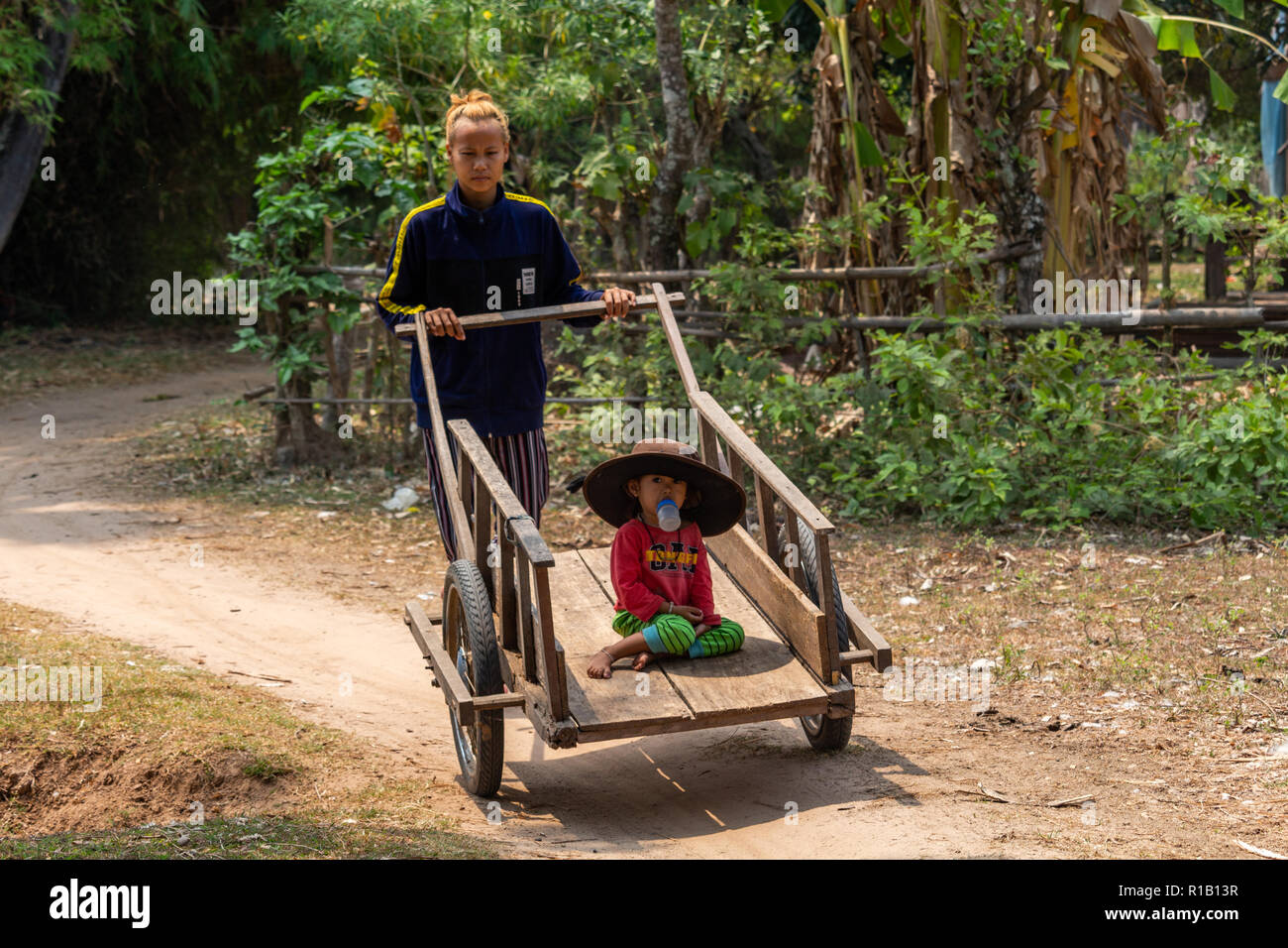 Laos mother child carry lao hi-res stock photography and images - Alamy