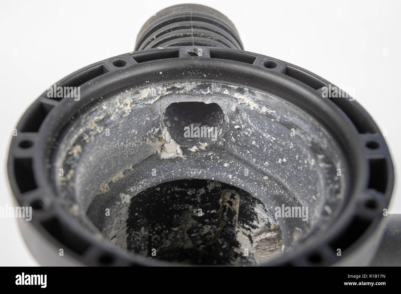 Old washing machine pump. Spare parts for household appliances. Light ...