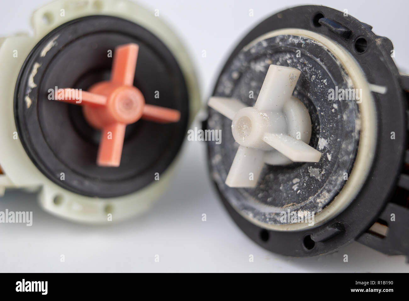Old washing machine pump. Spare parts for household appliances. Light ...