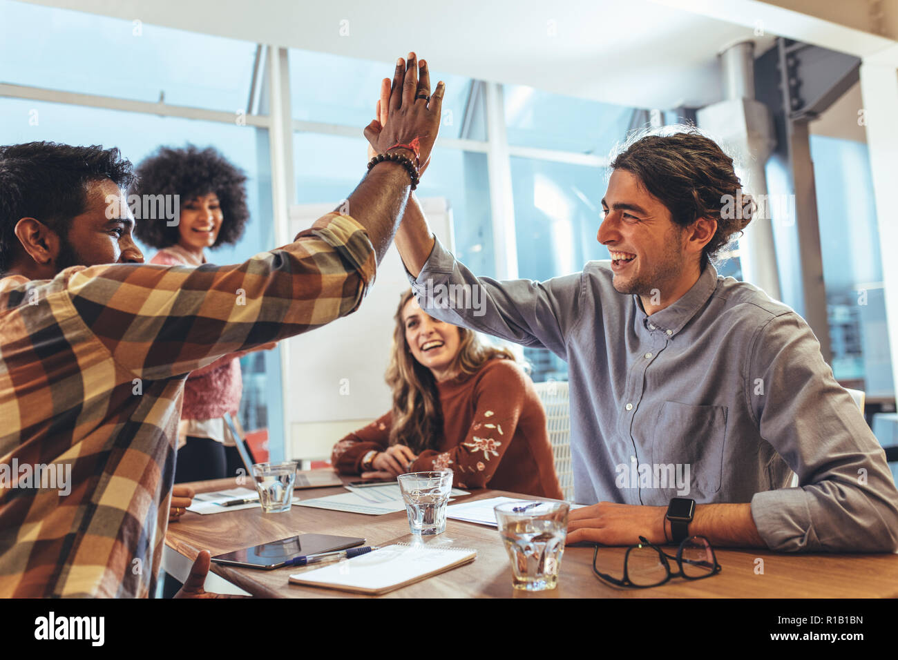 Coworkers look hi-res stock photography and images - Alamy