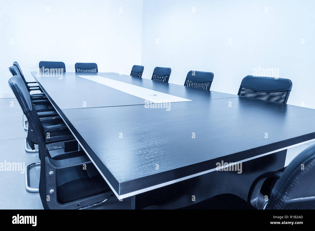 Conference room tables and chairs Stock Photo - Alamy