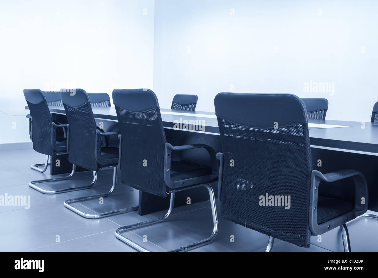 Conference room tables and chairs Stock Photo - Alamy