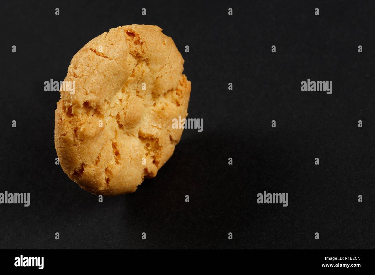 Cookie isolated on black background , close up Stock Photo - Alamy