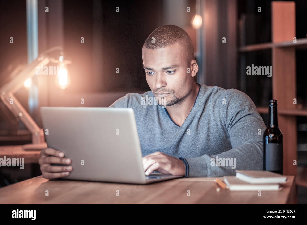 Concentrated programmer having difficult task Stock Photo - Alamy