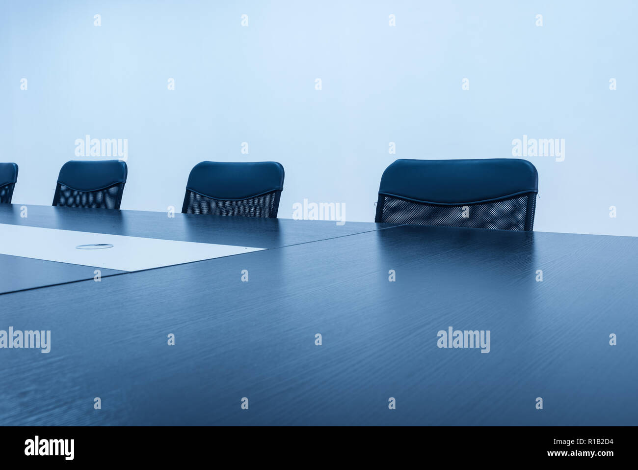 Conference room tables and chairs Stock Photo - Alamy