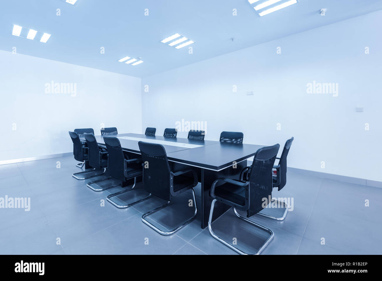 Conference room tables and chairs Stock Photo - Alamy