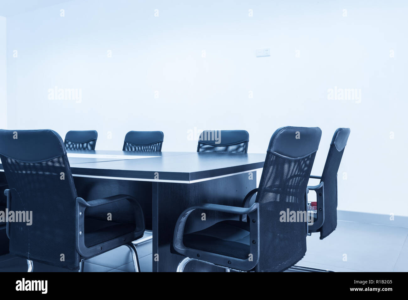 Conference room tables and chairs Stock Photo - Alamy