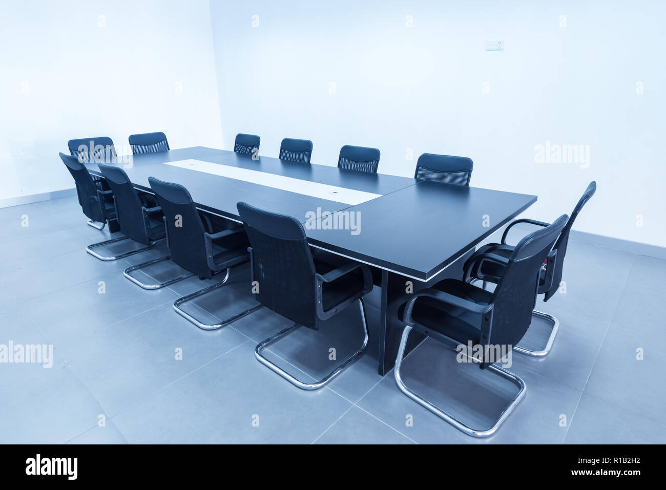 Conference room tables and chairs Stock Photo - Alamy