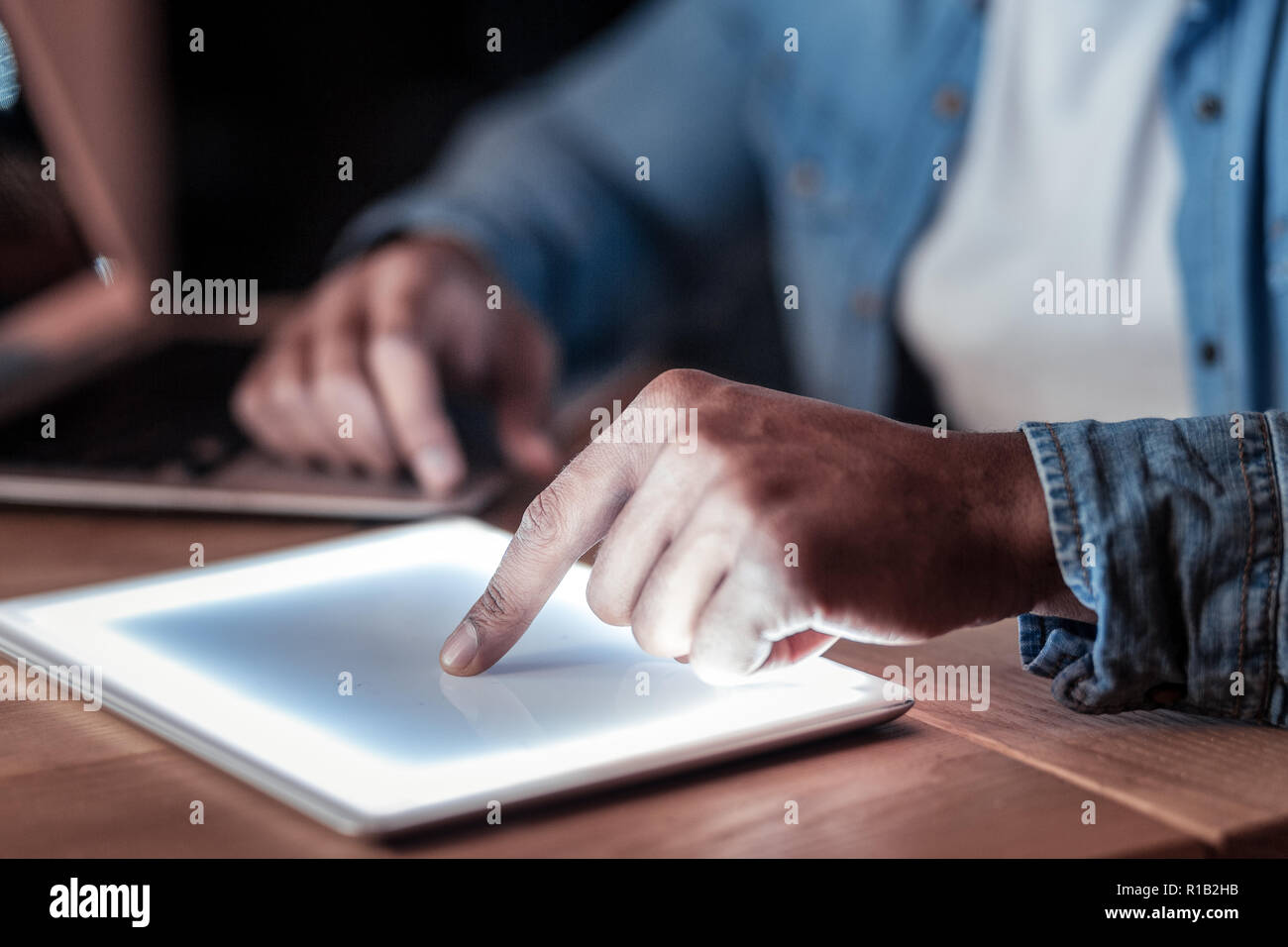 Close up of male hands that touching gadgets Stock Photo - Alamy