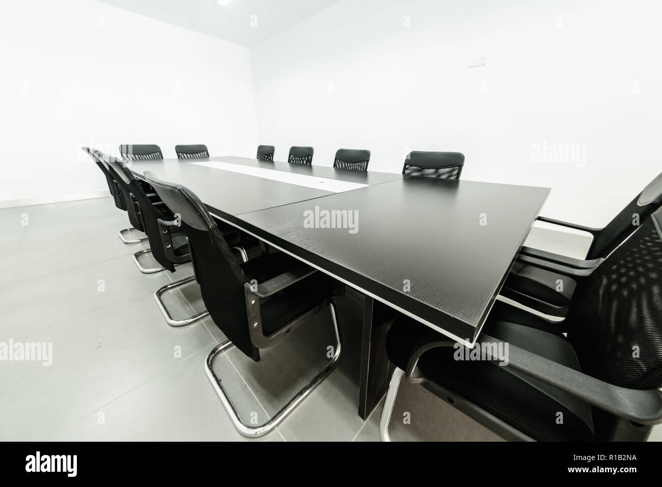 Conference room tables and chairs Stock Photo - Alamy