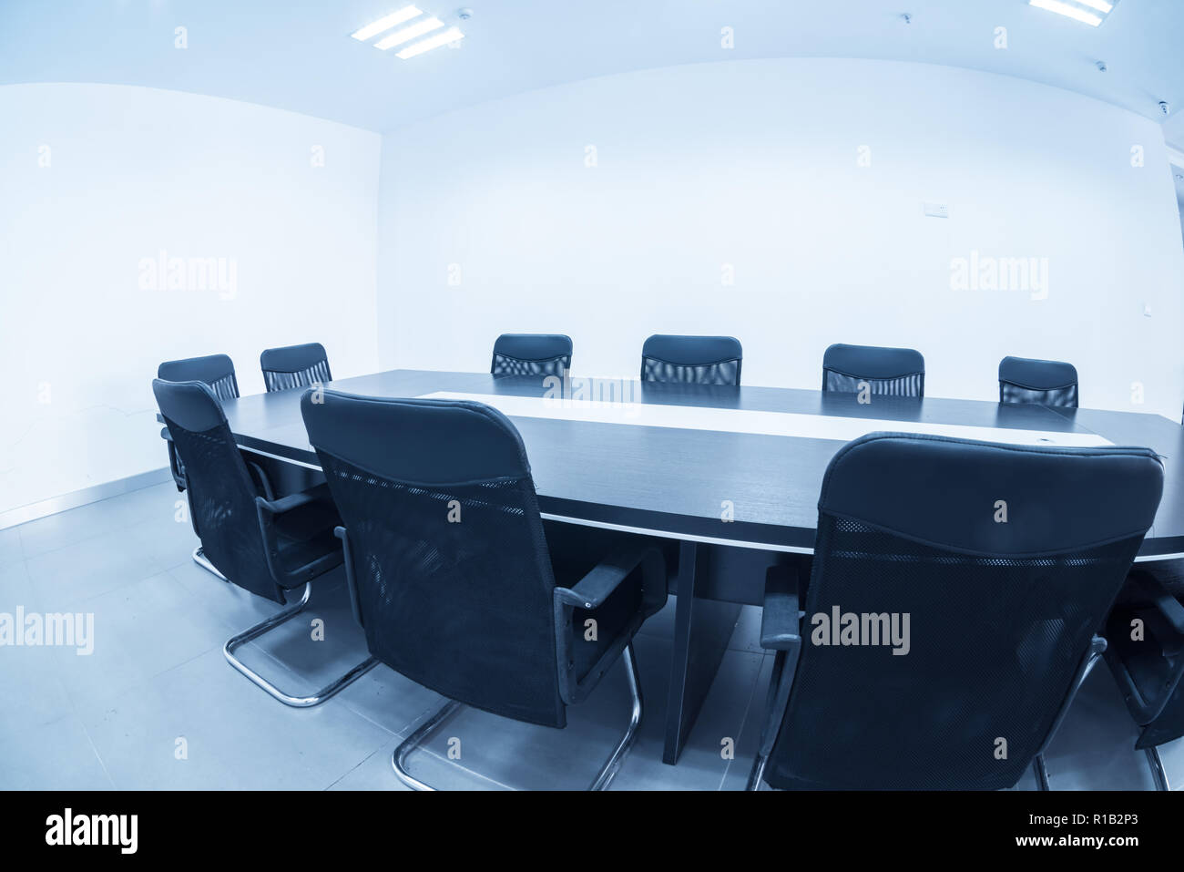 Conference room tables and chairs Stock Photo - Alamy