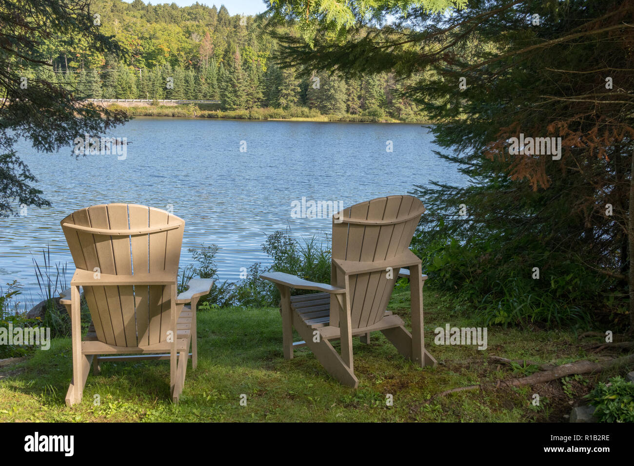 Two seats by a Lake Landscape Stock Photo - Alamy