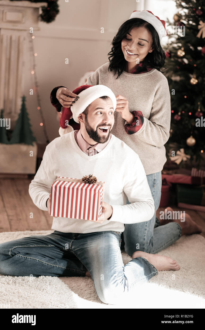 Joyful male person making funny faces Stock Photo - Alamy