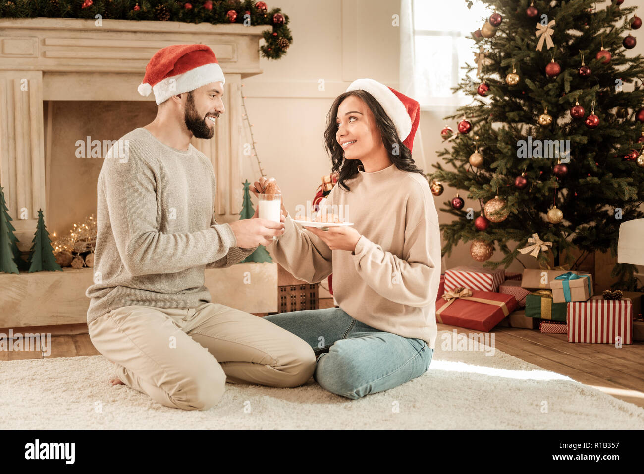 Santa eating cookies hi-res stock photography and images - Alamy