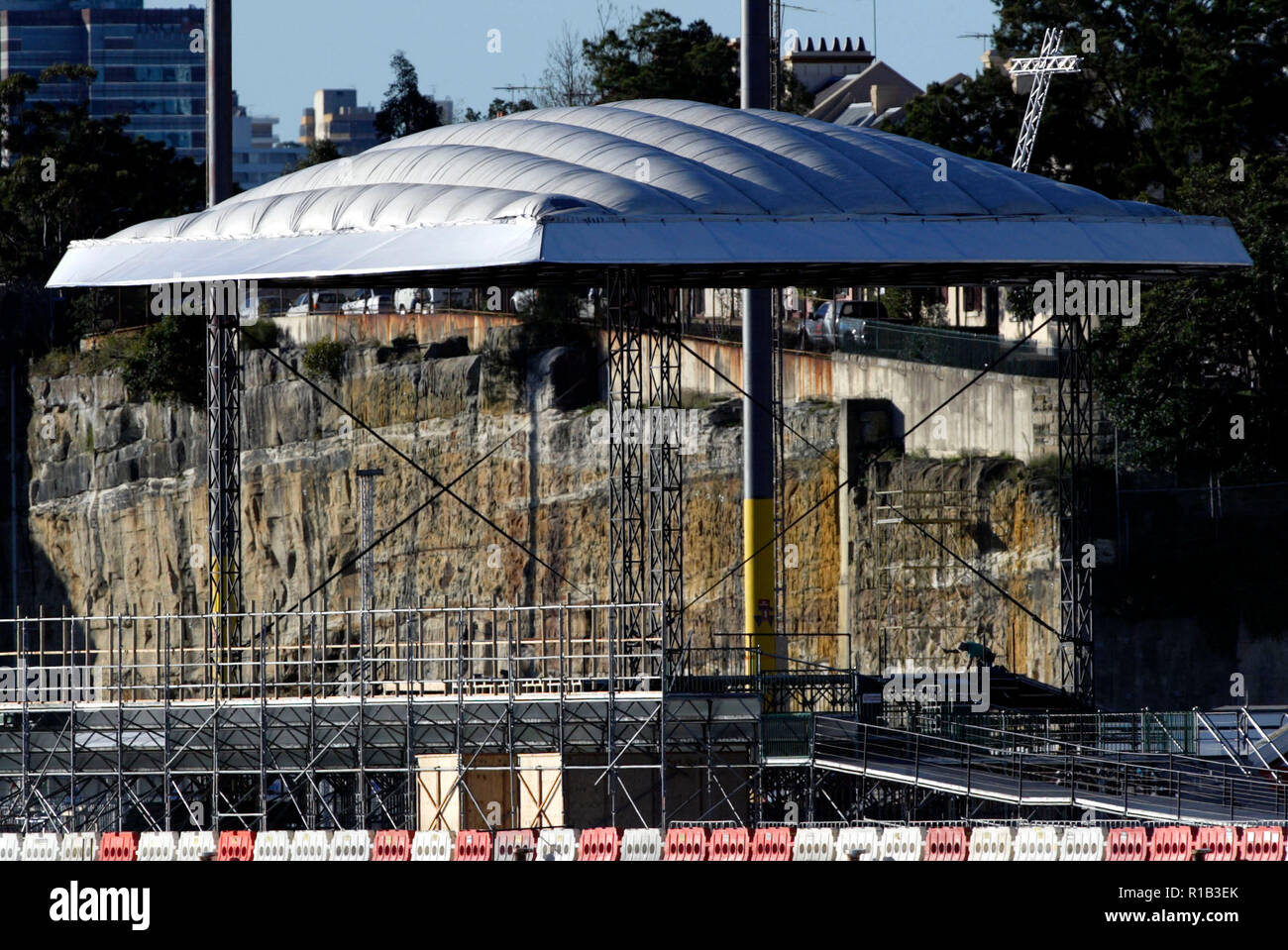A labourer works on the massive stage and altar being constructed for ...