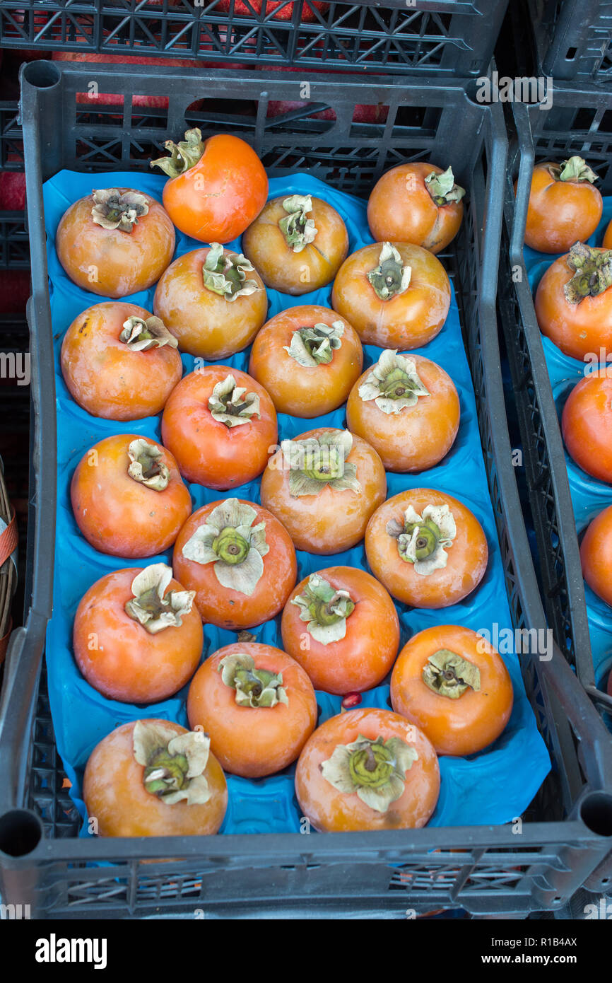 Persimmons in turkish street hi-res stock photography and images - Alamy