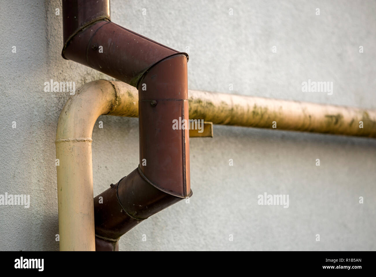Close-up detail of old dirty painted yellow natural gas and brown ...