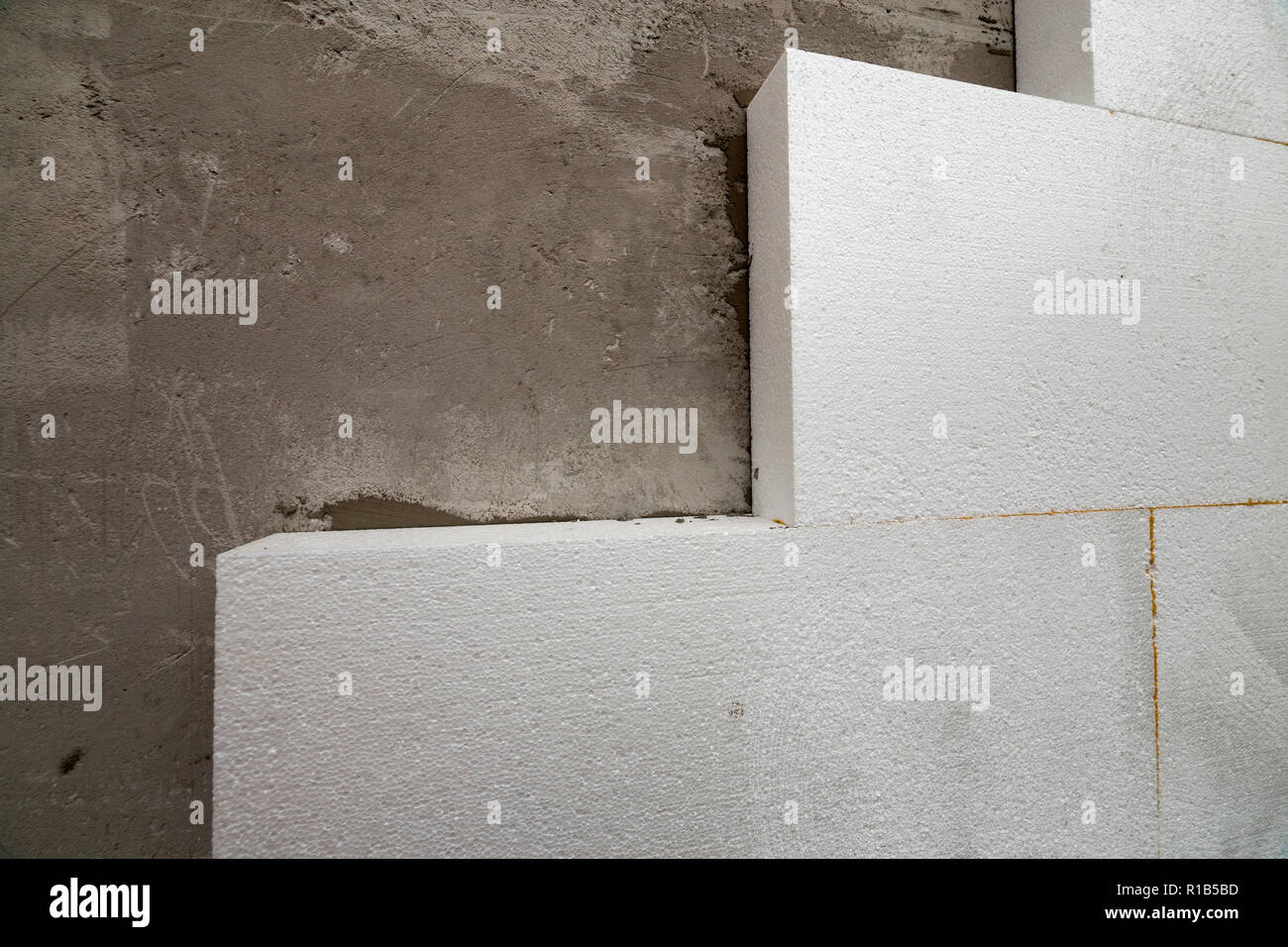 Close-up detail of plastered house wall with rigid styrofoam insulation ...