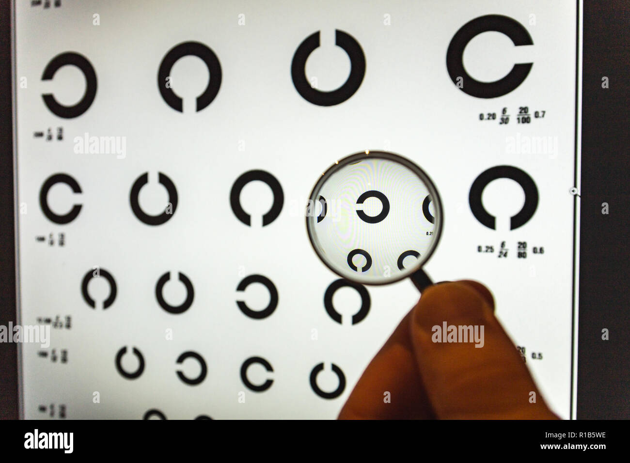 negative concave ophthalmic lens on a blurred background of the Stock ...