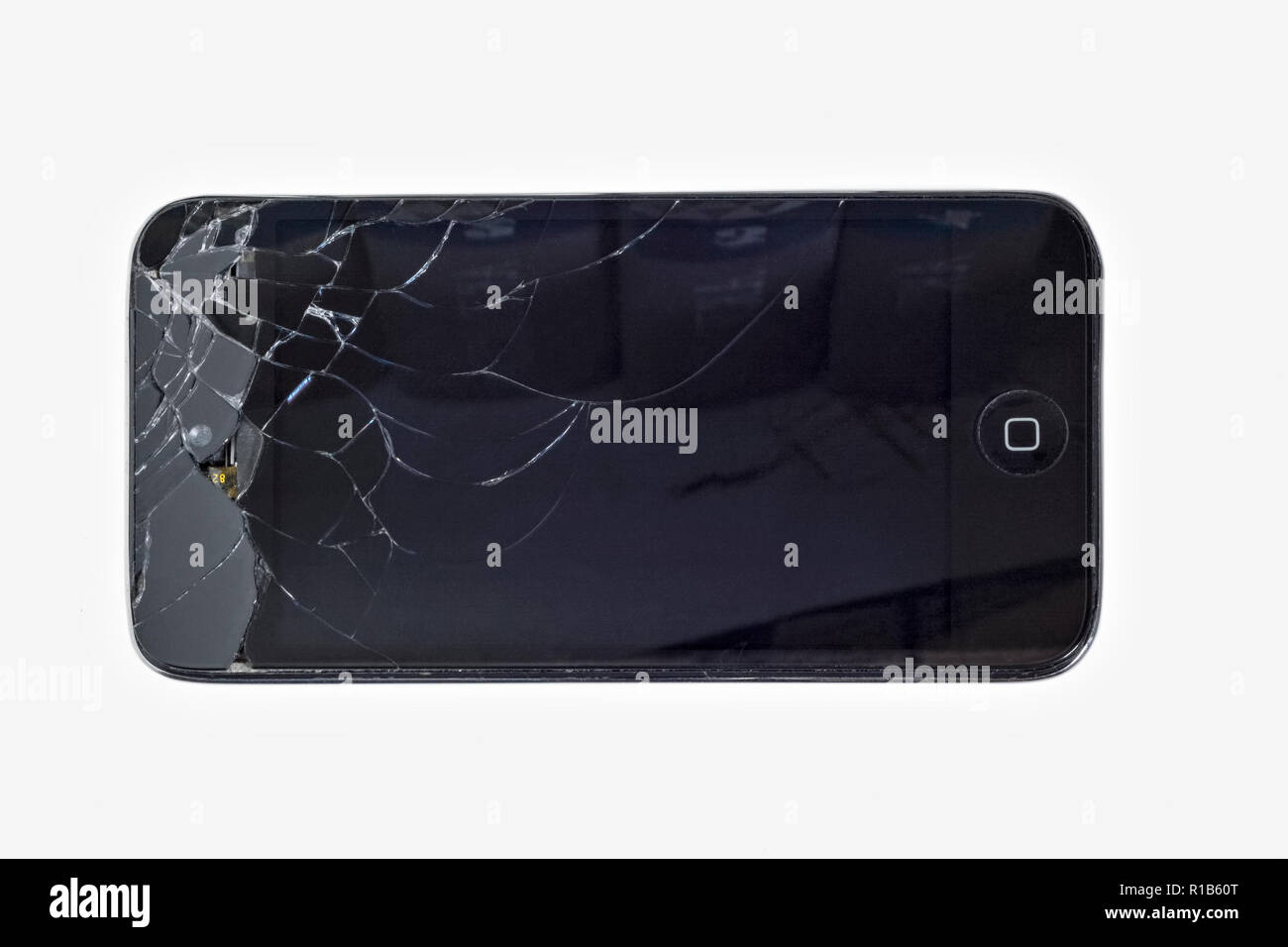 Smartphone black with smashed shattered screen on a white background ...