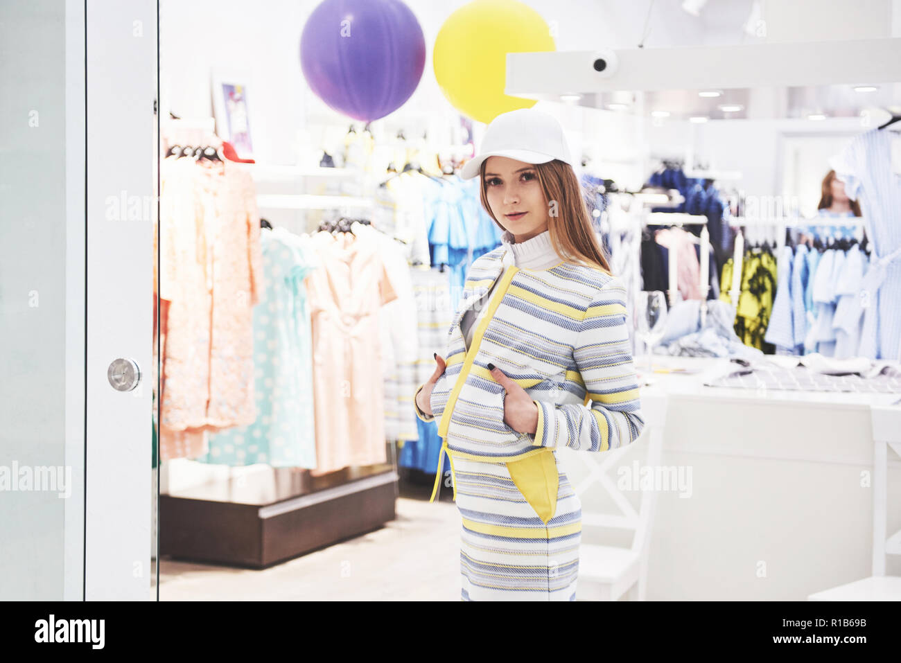 sale, fashion, consumerism and people concept - happy young woman with ...