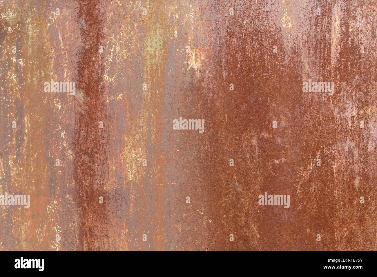 Old rusty metal surface with paint residue as a background or backdrop ...