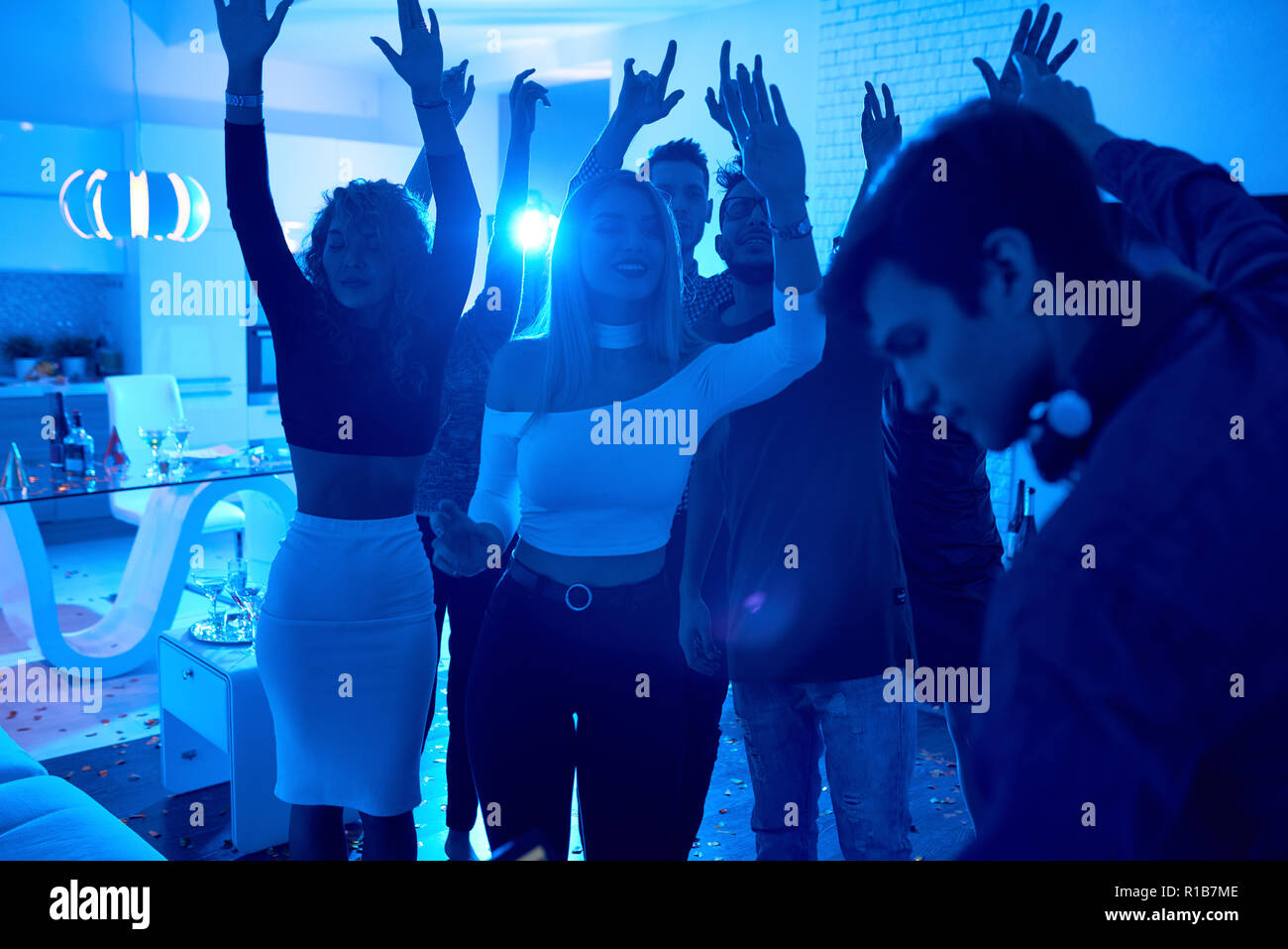 People Dancing At A House Party