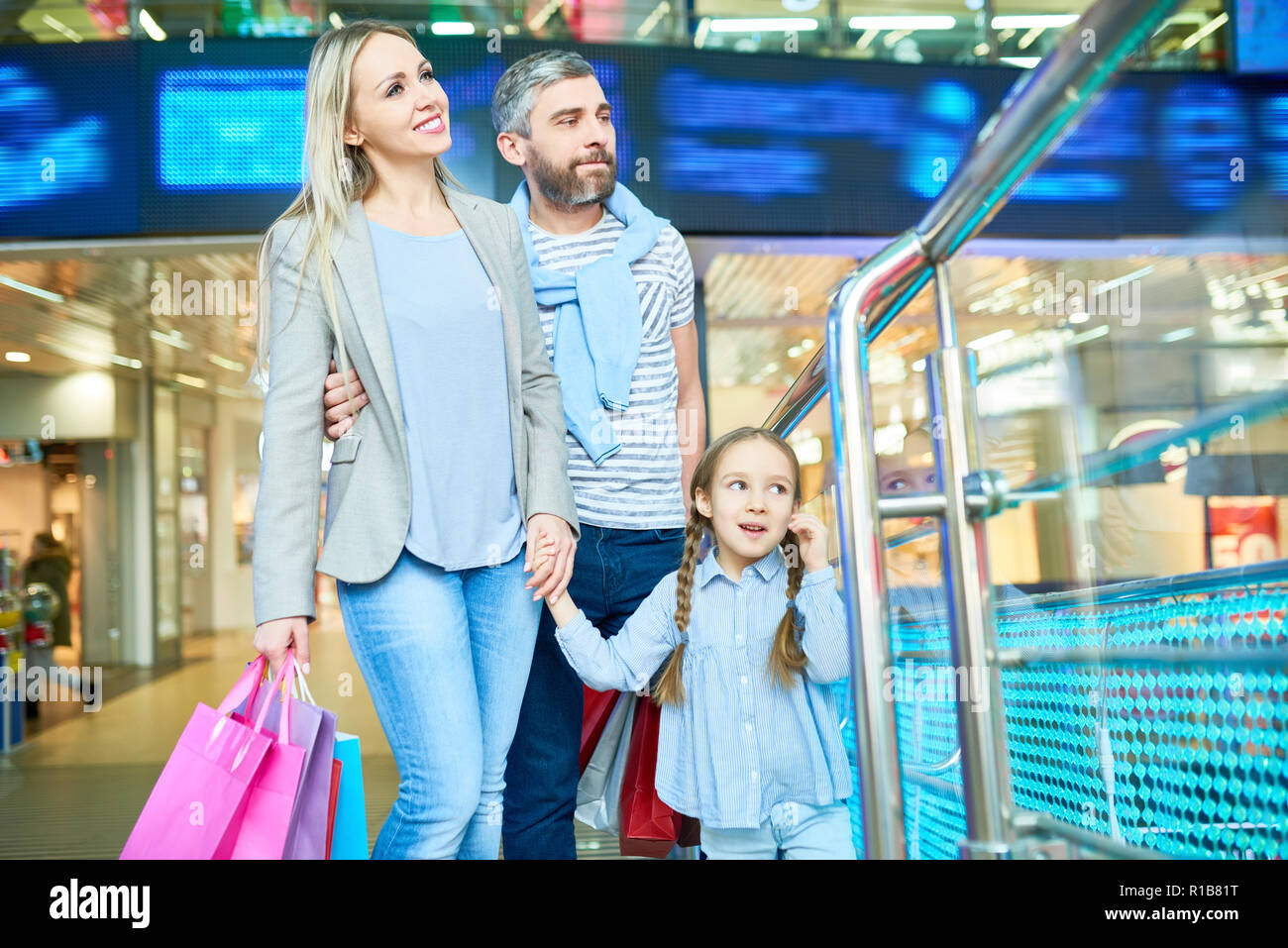 Family Shopping in Big Mall Stock Photo - Alamy