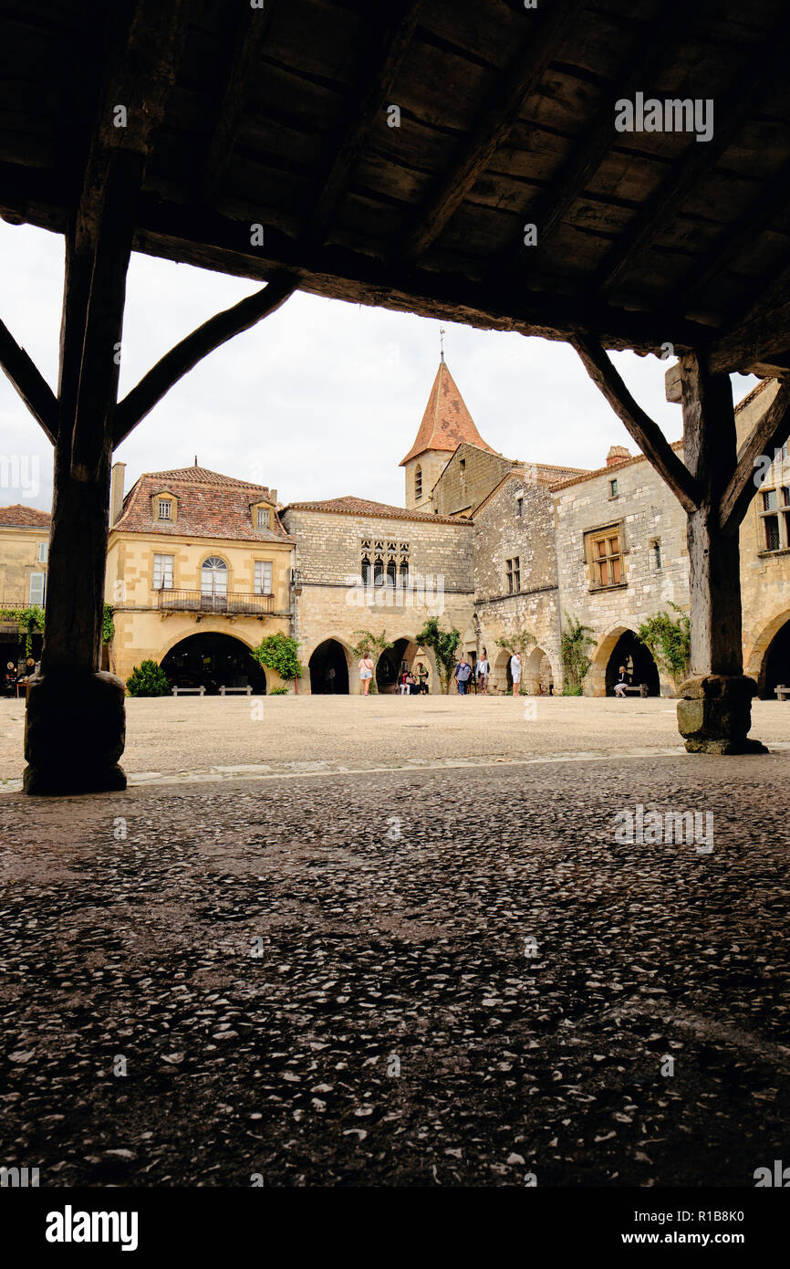 The medieval main square of Monpazier in the Dordogne France Stock ...