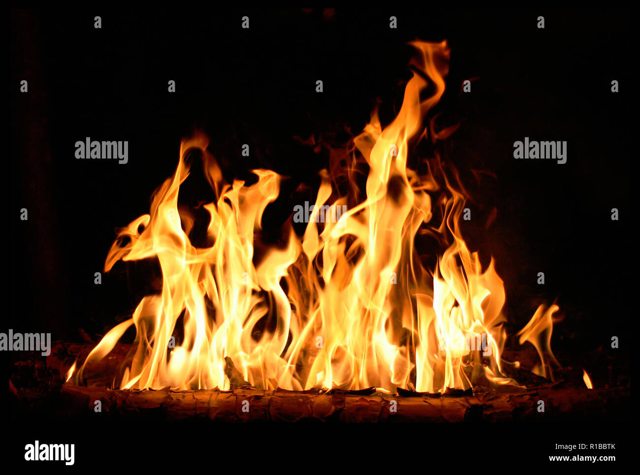 fire flames at night on a black background Stock Photo - Alamy